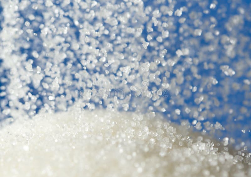 Sugar on a blue background stock image. Image of concept - 103694805