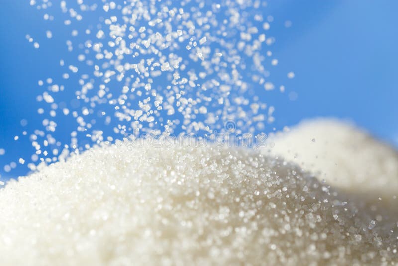Sugar on a blue background stock image. Image of white - 104186999