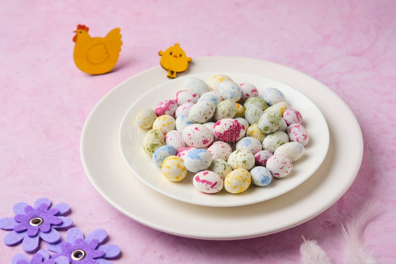 Sugar Candy in the Form of Bird Eggs on a White Plate on a Pink ...
