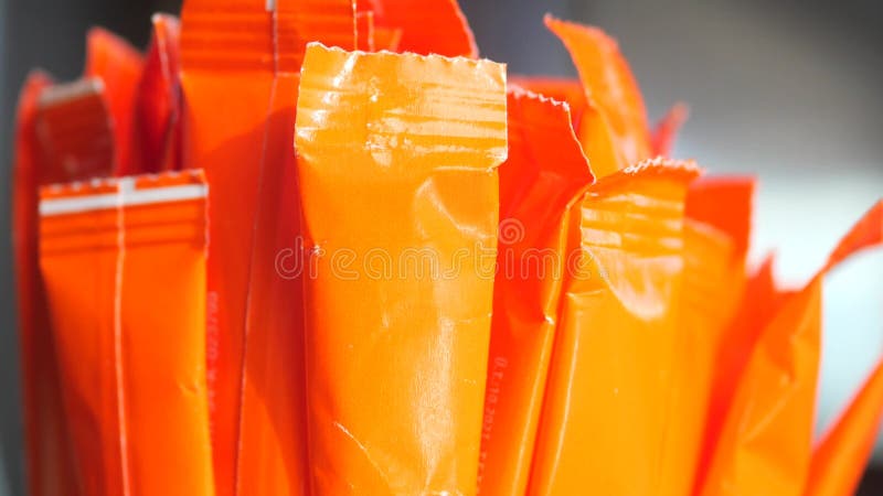 Sugar in a Colorful packet stock footage. Video of dessert - 376734708
