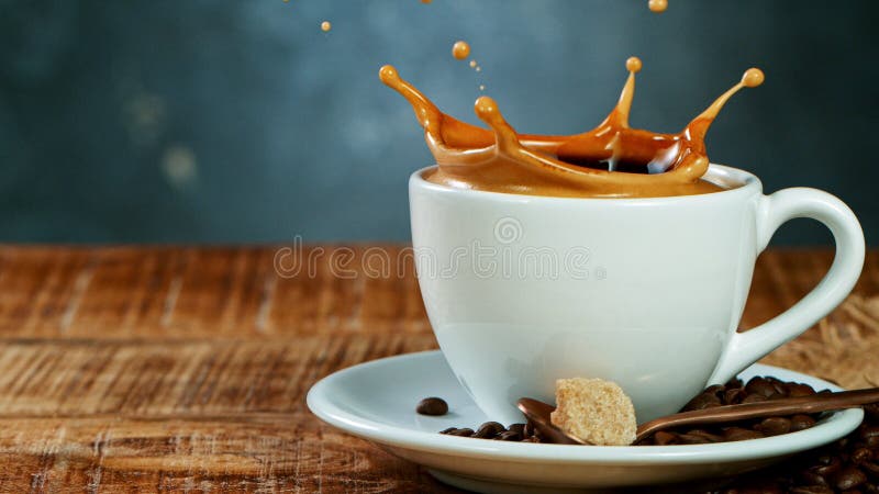Sugar Cube Falling into a Cup of Coffee Stock Image - Image of brown ...
