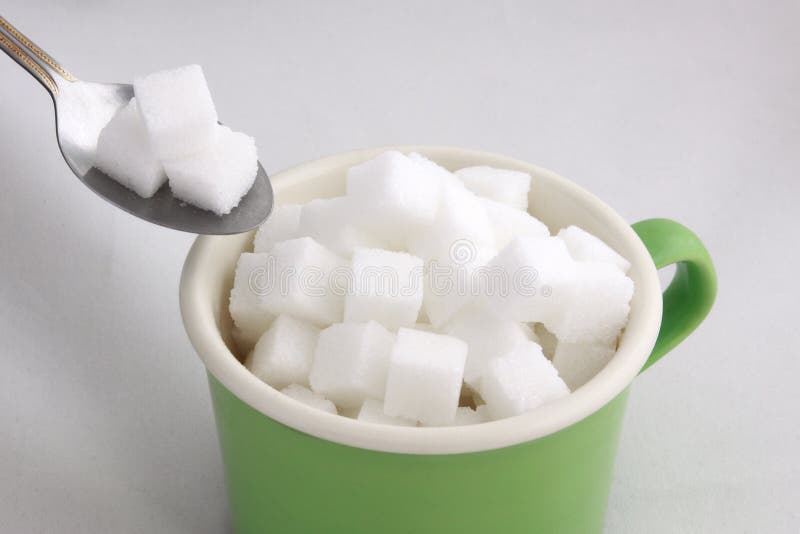 Sugar Cube in Green Tea Cub Stock Photo - Image of concepts, closeup ...