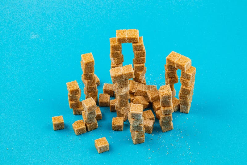 Sugar Cubes Creatively Arranged in Various Structures on Blue ...