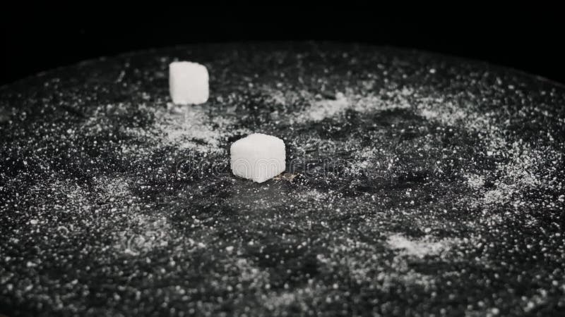 Sugar Cubes Fall on the Rotating Table in Slow Motion Close Up Stock ...