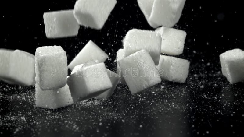 Sugar Cubes Fall on the Table. Filmed on a High-speed Camera at 1000 ...