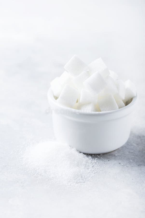 Sugar Cubes and Grain of Sugar Stock Photo - Image of bowl, dessert ...