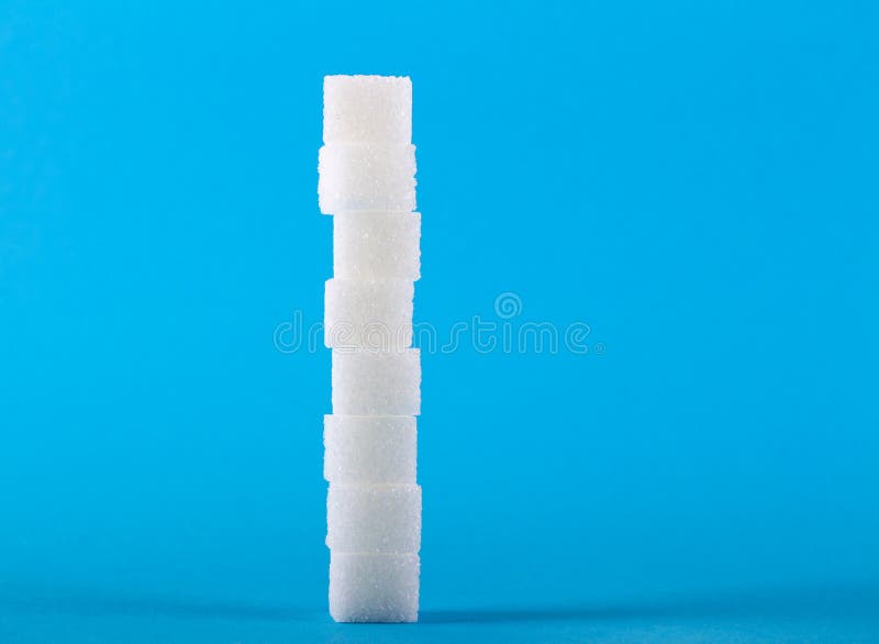 Sugar Cubes Over Blue Background Stock Photo - Image of food, cubes ...