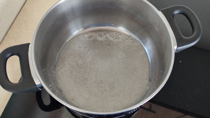 Sugar Dissolves in a Saucepan on the Stove. Making Homemade Paste for ...