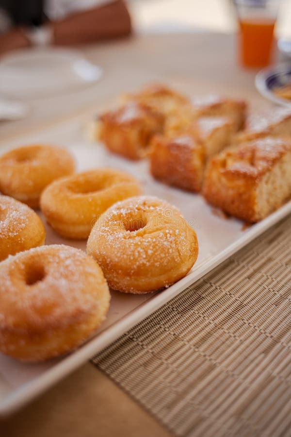 Sugar Donuts in a Row Served on a Plate Stock Photo - Image of shelf ...