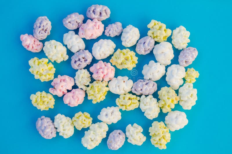 Sugar Dragees with Peanuts Inside, in the Form of Clouds, Lie on Blue ...