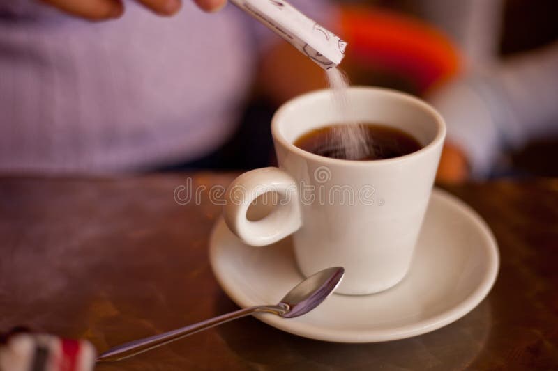 Sugar Falling in Cup Filled with Tea Stock Image - Image of spoon ...