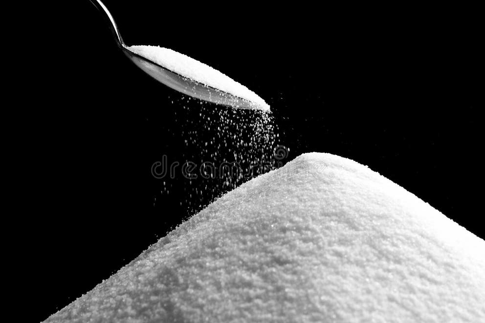 Sugar Falling from Spoon stock photo. Image of spoon - 13032458