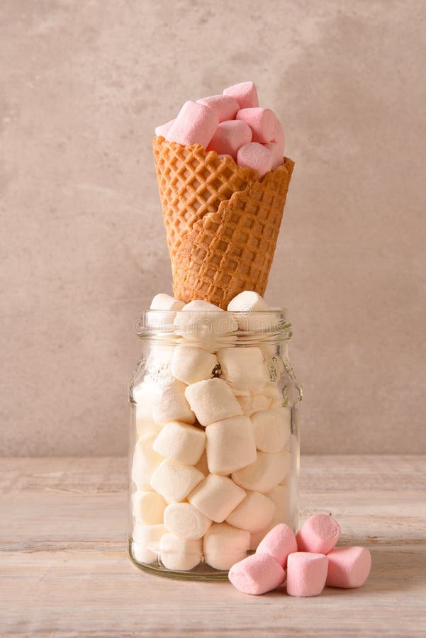 A Sugar Ice Cream Cone in a Jar of Mini Marshmallows and Filled with ...