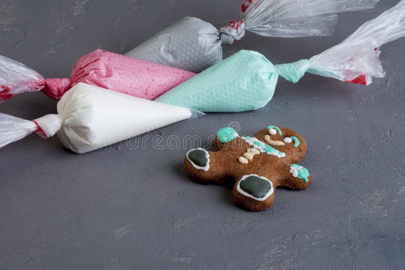 Sugar Icing of Different Colors in Pastry Bags, Scattered on the Table ...