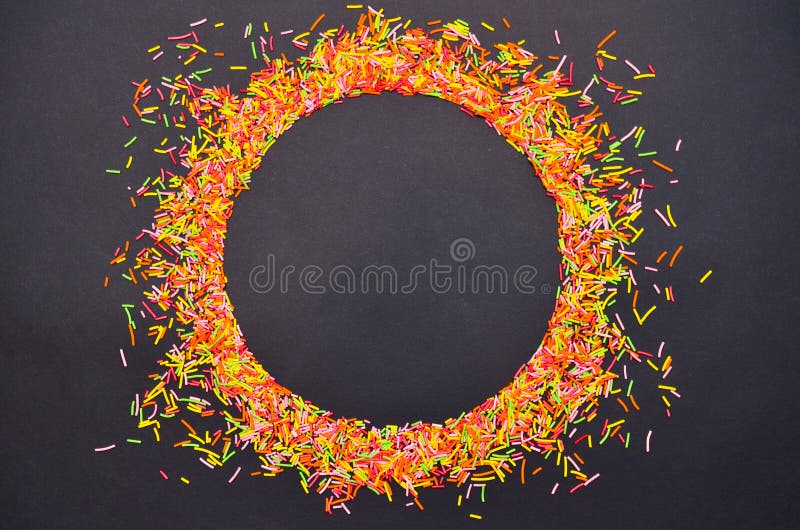 Long Baking Topping, Sprinkled from a Rainbow Spoon in White Saucer, on ...