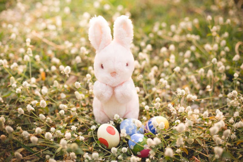 Sugar Rabbit and Easter Eggs on Meadow. Stock Photo - Image of meadow ...