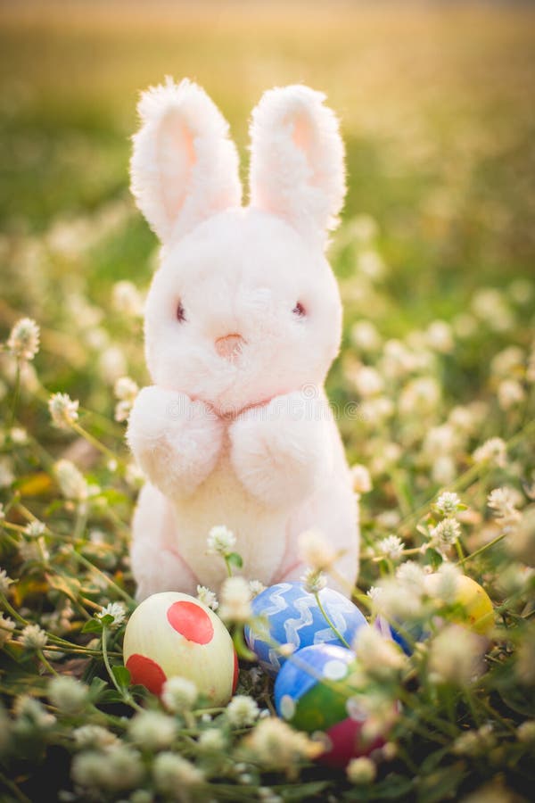 Sugar Rabbit and Easter Eggs on Meadow. Stock Image - Image of april ...