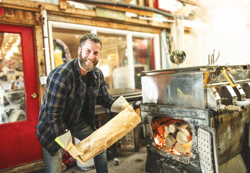 Sugar Shack, a Maple Farmer Wearing a Traditional Clothe Working Doing ...