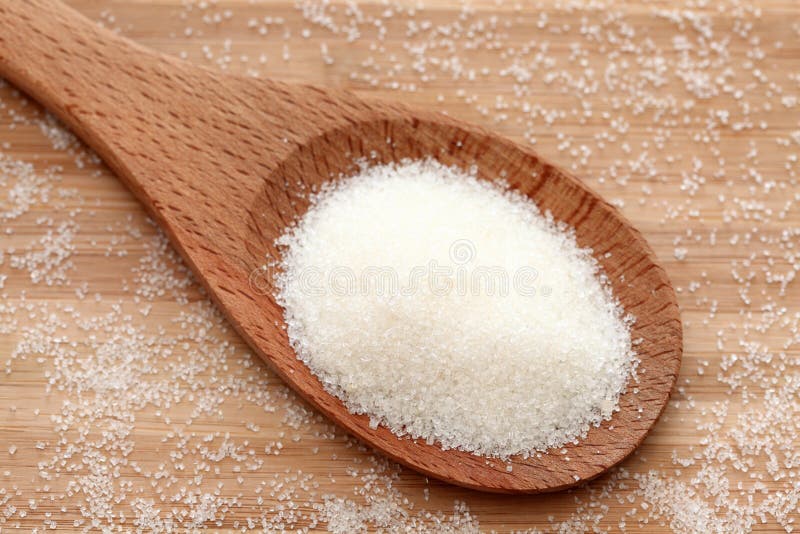 Sugar in a wooden spoon stock photo. Image of wooden - 44568380