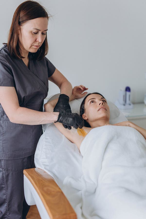 Sugaring: Epilation with Liquate Sugar at Armpit. Stock Photo - Image ... Sugaring: Epilation with Liquate Sugar at Armpit. Stock Photo - Image ...