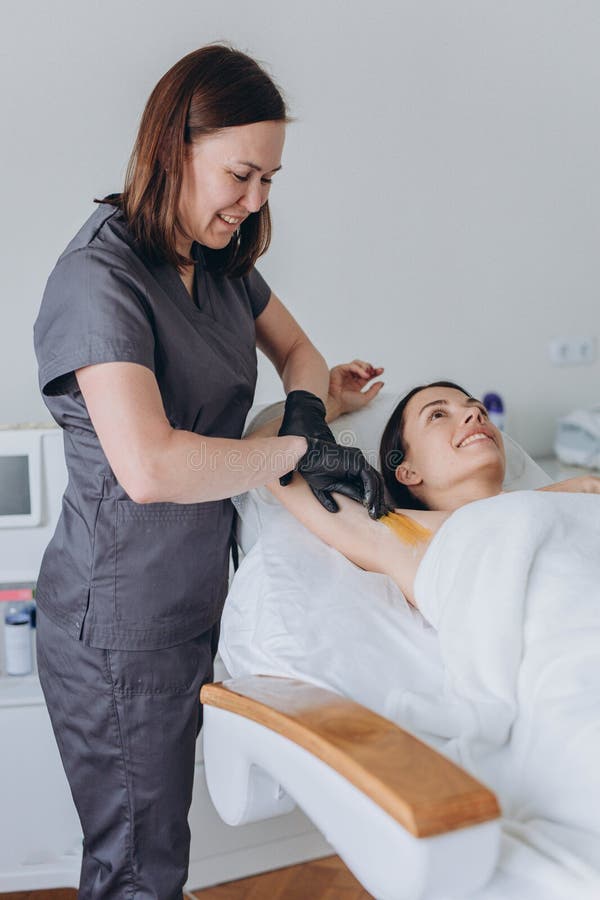 Sugaring: Epilation with Liquate Sugar at Armpit. Stock Photo - Image ... Sugaring: Epilation with Liquate Sugar at Armpit. Stock Photo - Image ...