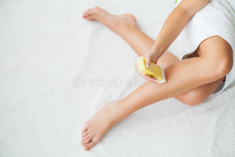 Sugaring: Epilation with Liquate Sugar at Legs Stock Image - Image of ...