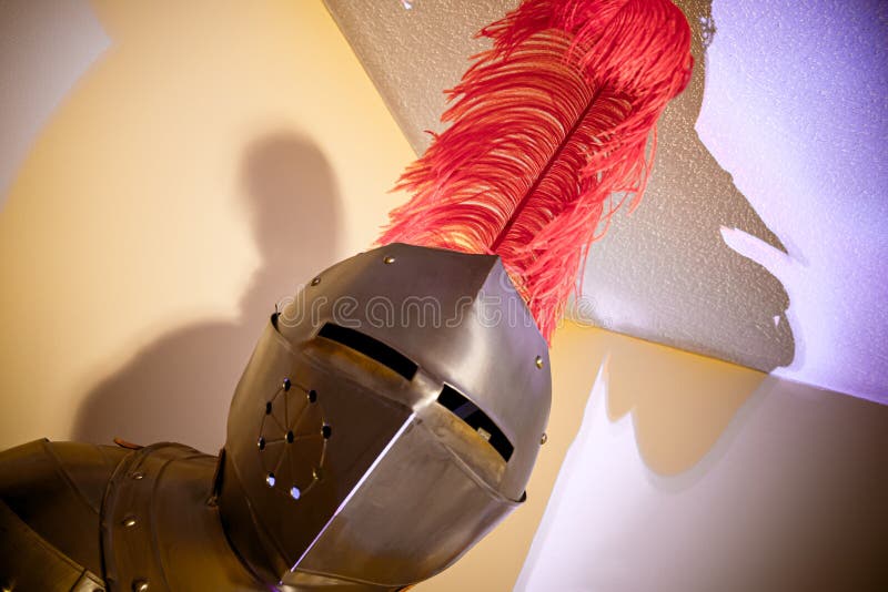 Suit of Armor with Red Feather Cap Stock Image - Image of metal, castle ...