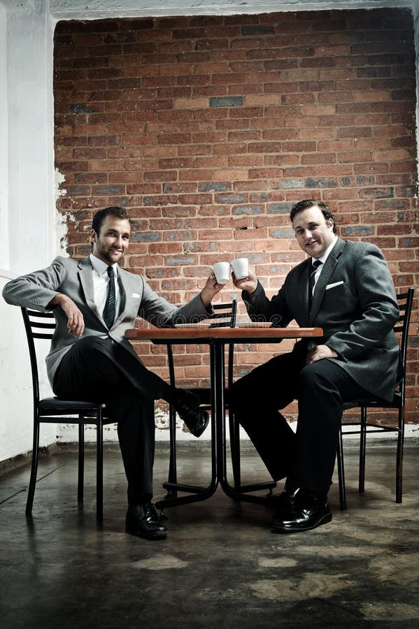 Suit Wearing Men Make a Deal Stock Photo - Image of conceptual, happy ...