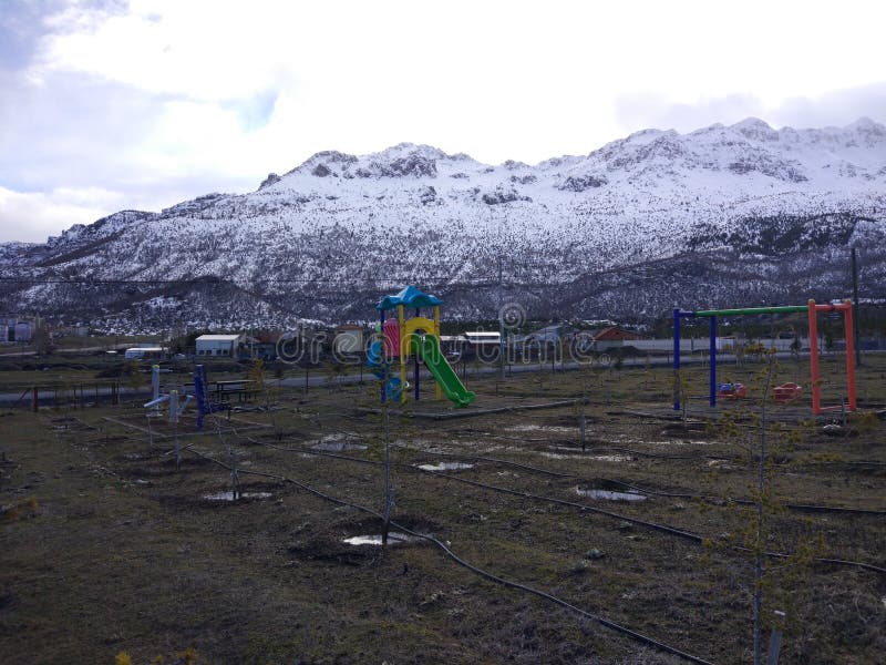 Children's Playground In The Mountains Stock Photo - Image of house ...