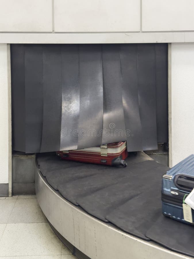 Suitcase on Baggage Claim Conveyor Belt Stock Photo - Image of travel ...