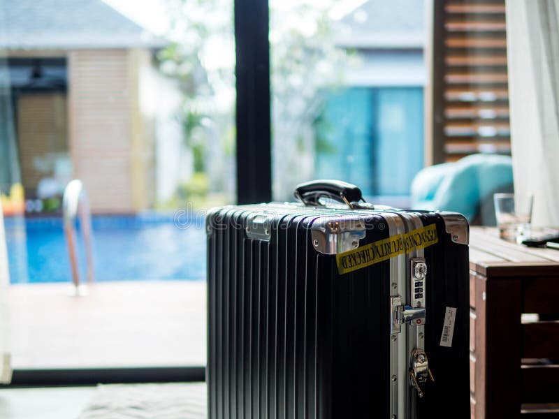 Suitcase in Hotel Room. Ready for Check in or Check Out Stock Photo ...