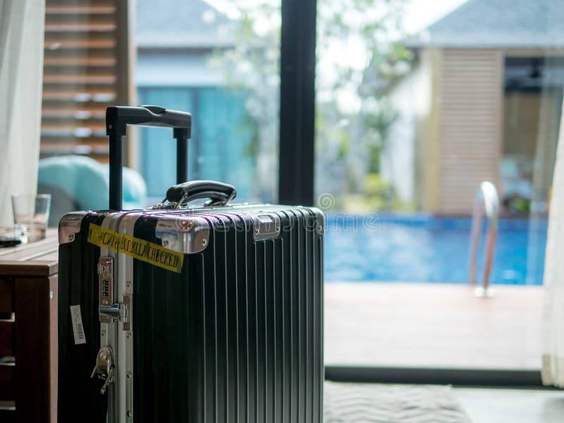Suitcase in Hotel Room. Ready for Check in or Check Out Stock Photo ...