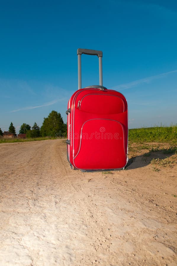 Suitcase on road stock image. Image of body, drive, fashion - 14517297