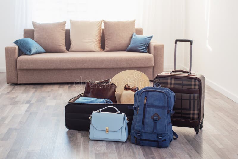 Suitcases Packed for Travel on Living Room Stock Image - Image of ... Suitcases Packed for Travel on Living Room Stock Image - Image of ...