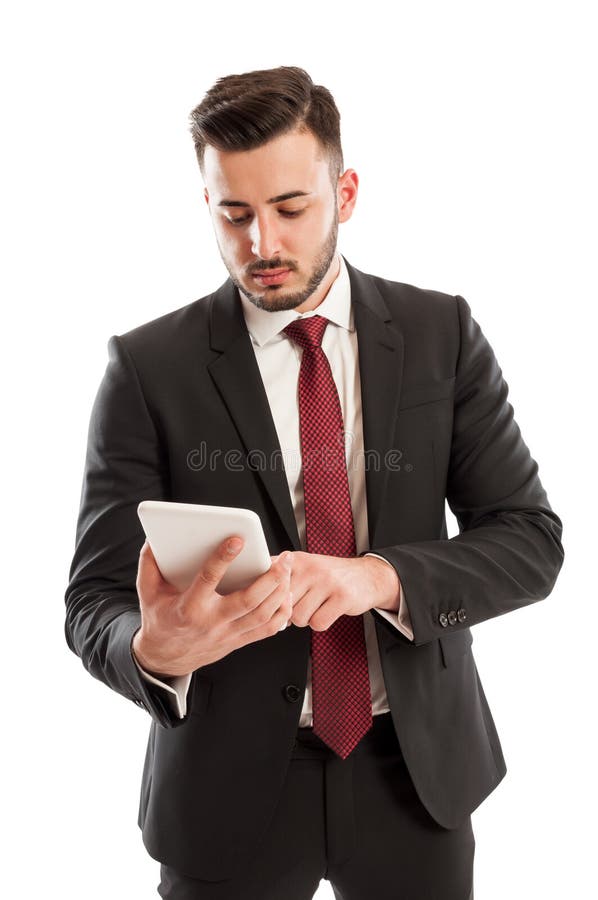 Suited Business Man Using a Tablet Stock Image - Image of hand, digital ...