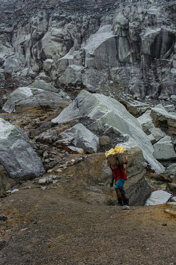 Sulfur Carrier on Ijen Volcano, East Java Editorial Photography - Image ...