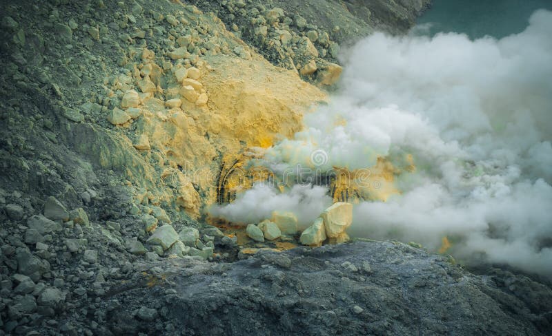 Sulfur Miners Inside Crater of Ijen Volcano, East Java, Indonesia Stock ...