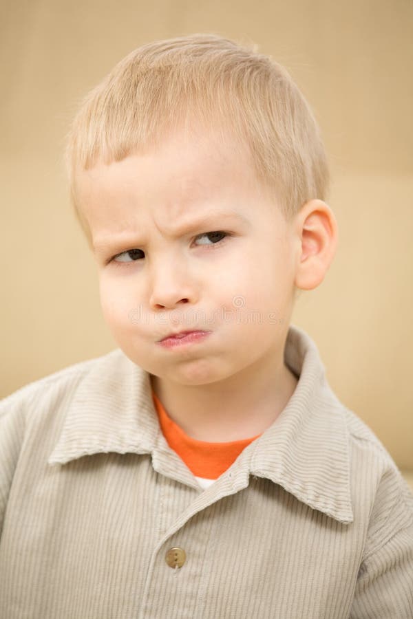 Sulking boy stock image. Image of front, portrait, studio - 8142747