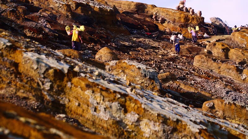 Hard Work of Sulphur Miners of East Java on Dangerous and Hard Work ...