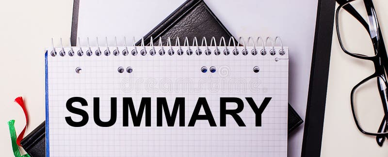 SUMMARY is Written in Red in a White Notebook Next To Black-framed ...