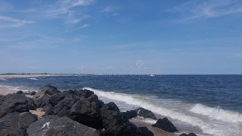 Summer Afternoon at the Beach Stock Photo - Image of rocks, shore: 98195808