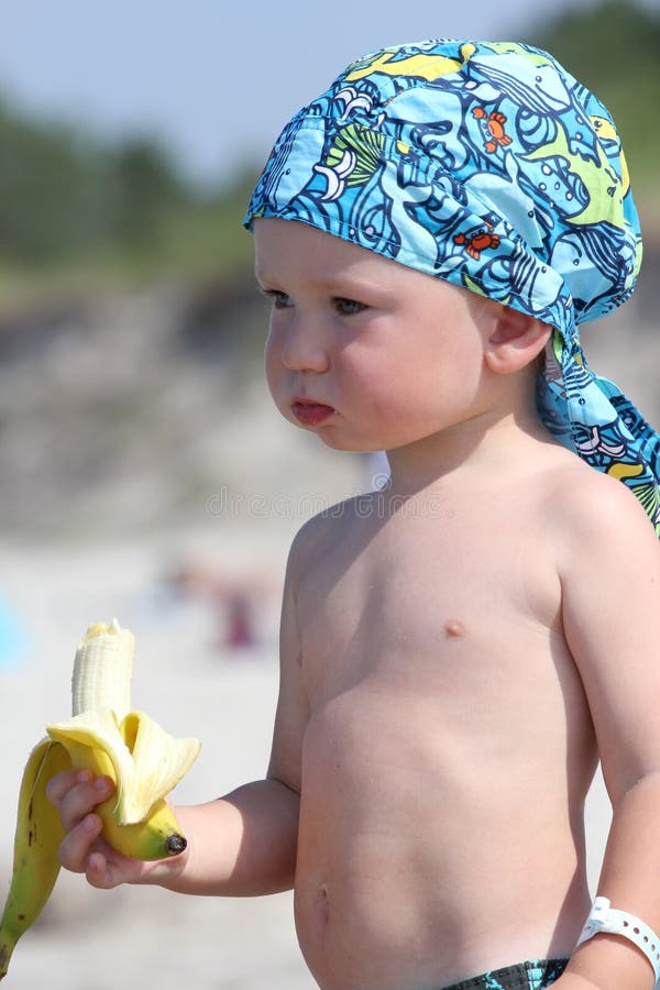 Summer baby eating banana stock photo. Image of banana - 15430046