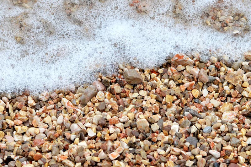 Sea Water Foam and Pebbles on the Beach Stock Photo - Image of pebbles ...