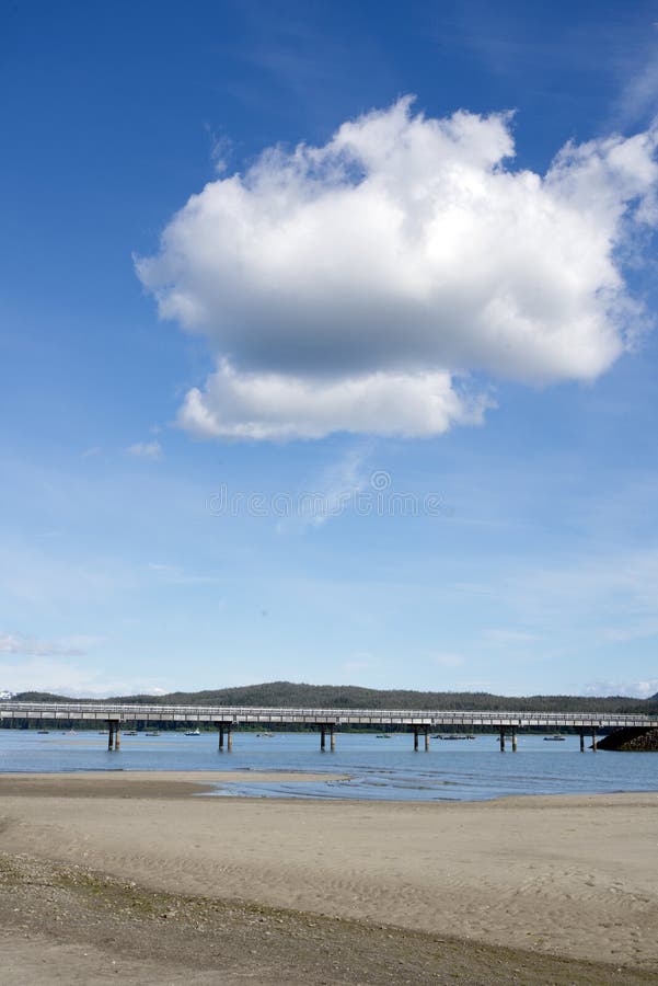 Summer Beach with Dock Road Pilings in the Background in Southeast ...