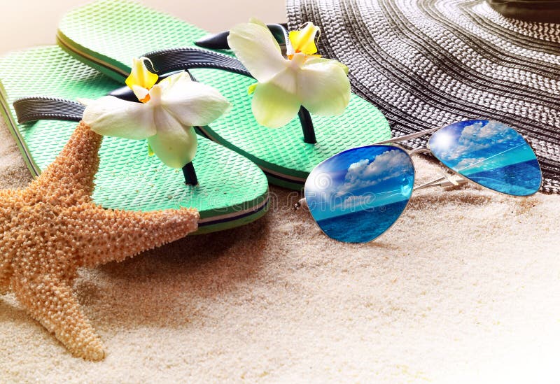 Summer Beach. Flip Flops and Sunglasses on the Sand. Stock Photo ...