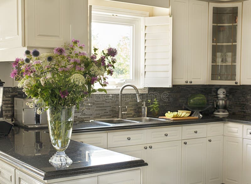 Summer Bouqet, Watermelon and Melon on Kitchen Table. Kitchen Interior ...