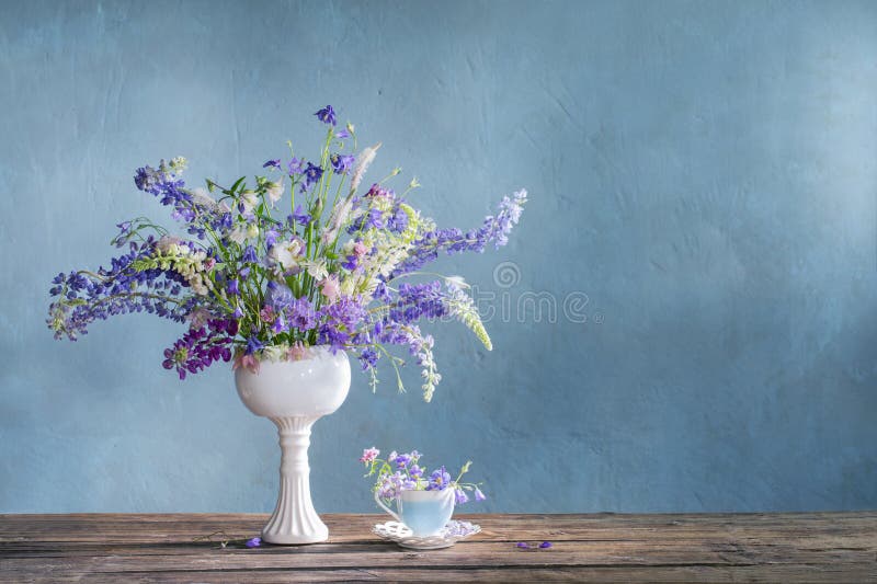 Bouquet in Blue and Violet Colors on Blue Background Stock Photo ...