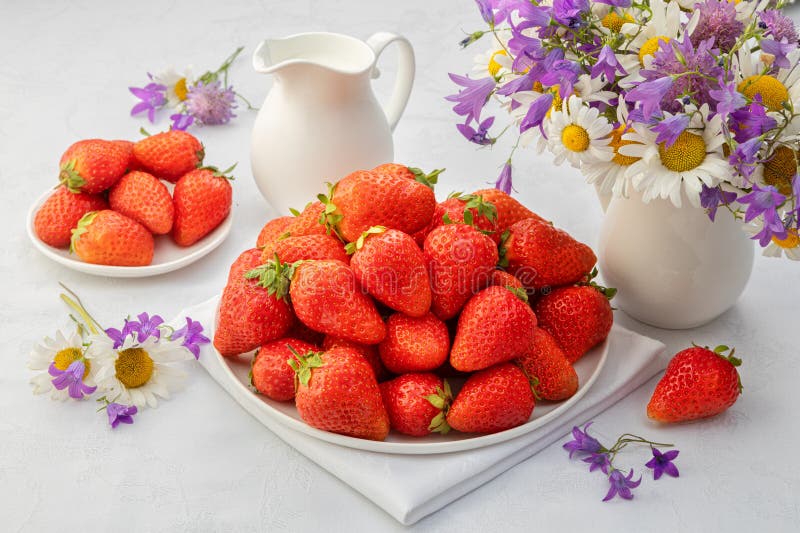 Summer Breakfast Concept. Strawberries on a Served Table and Lilacs ...