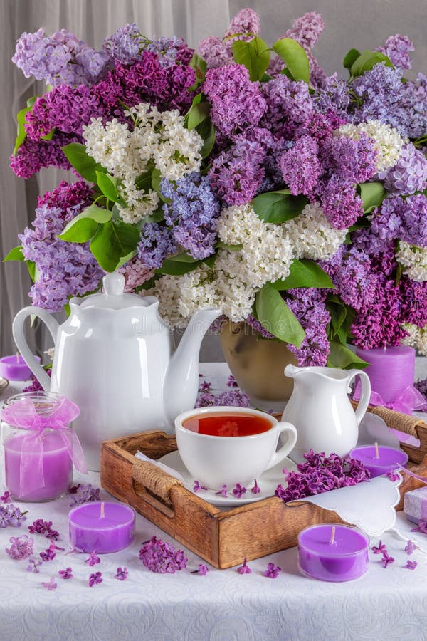 Summer Breakfast Concept. Tea in Cups and Lilacs on the Table Stock ...