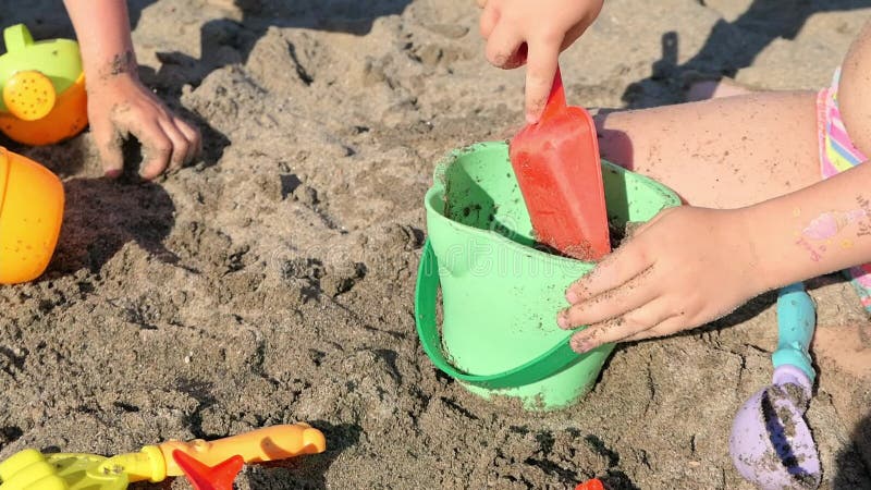 Summer Building Tools on Beach. Play with Water and Sand Stock Footage ...